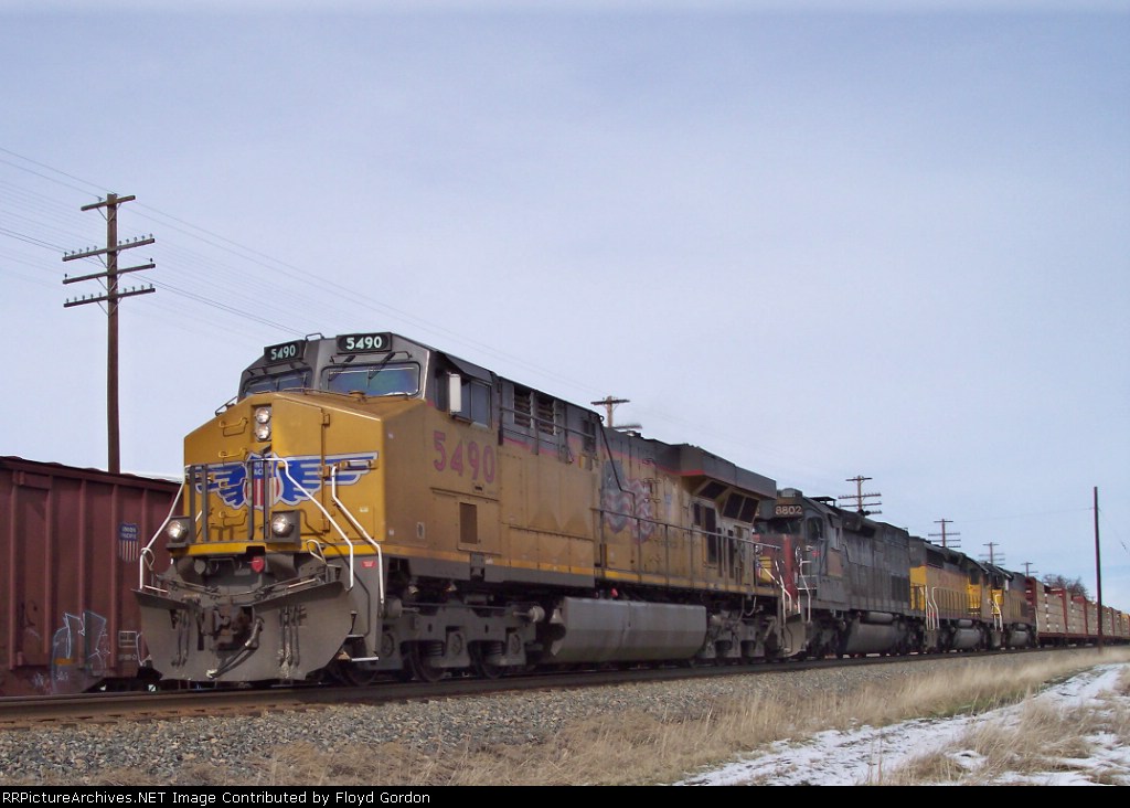 UP 5490 leads a mix of UP power eastbound